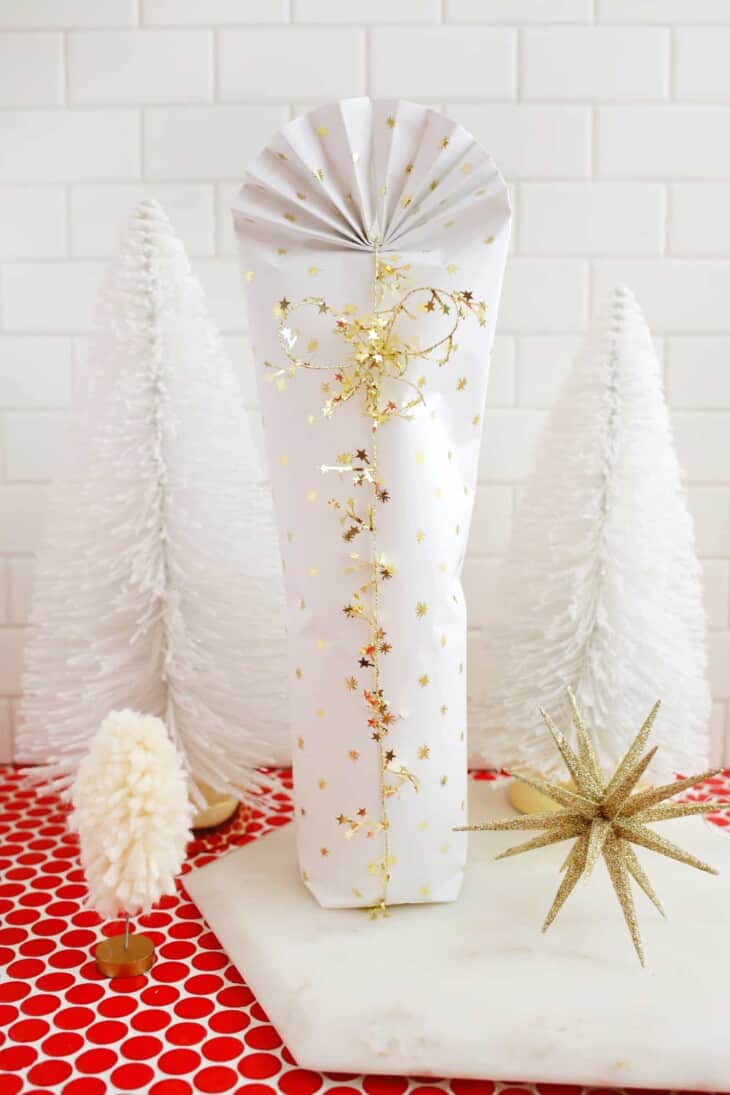 4 Easy Ways To Gift Wrap A Wine Bottle - A Beautiful Mess